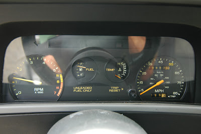 OLD PARKED CARS.: 1987 Ford EXP Sport Coupe.