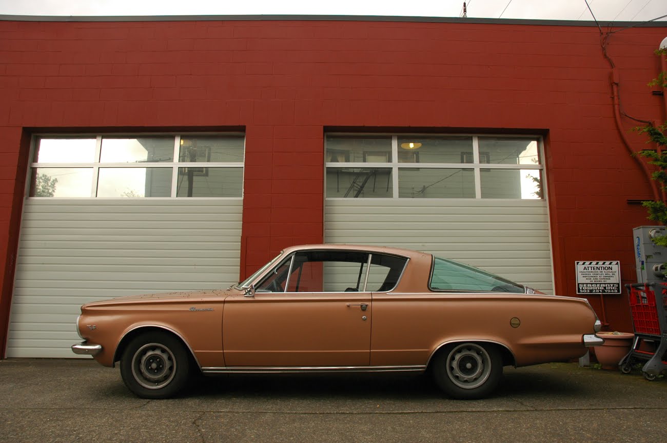 OLD PARKED CARS.: 1964 Plymouth Barracuda.