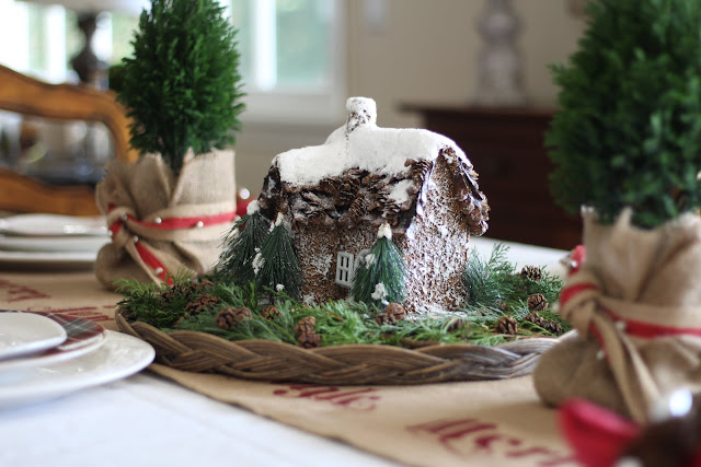 A Nature Inspired Christmas Tablescape Featuring Plaid, Pines, and Burlap