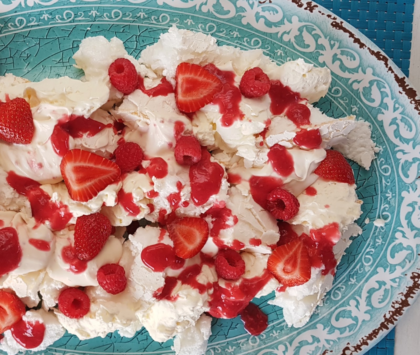 Smashed Pavlova with Raspberry Coulis Cream