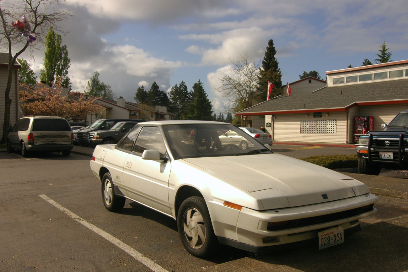 OLD PARKED CARS.: 1988 Subaru XT6.