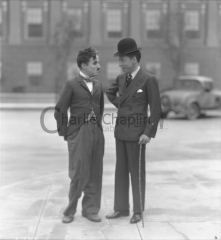 Chaplin with his friend, cartoonist Ralph Barton, on the set of CITY ...
