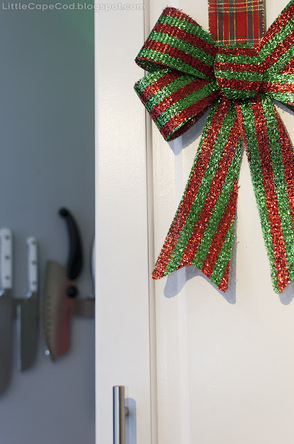 Little Cape Cod: Dollar Tree Kitchen Cabinet Ribbon-Hung Christmas Bows!