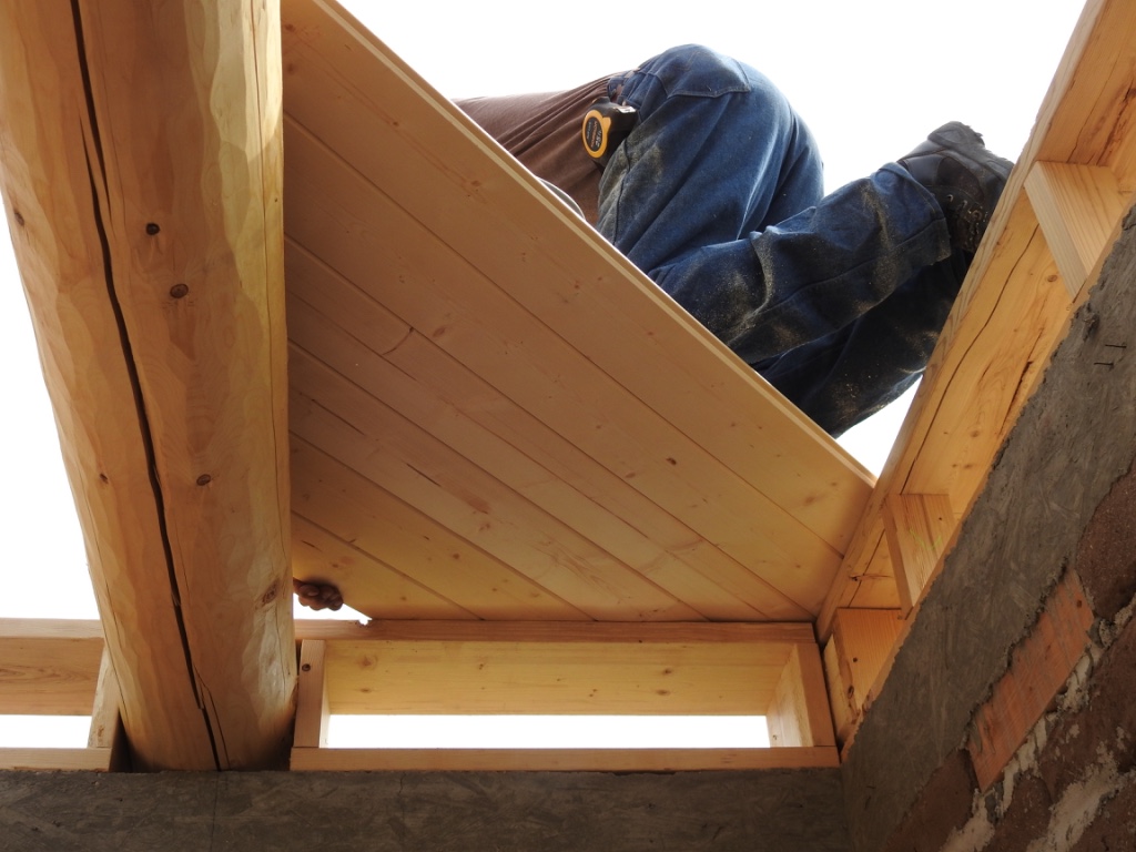 Ajijaakwe: Vigas complete; herringbone ceiling under way.