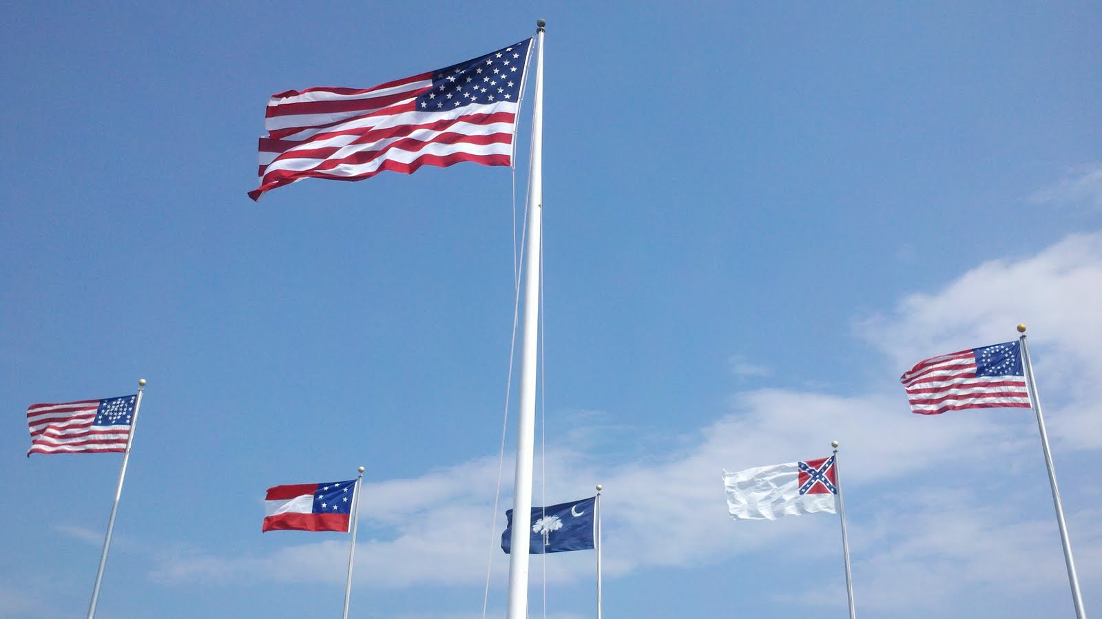 From The Land of Palm Trees: The Flags Flying Over Fort Sumter