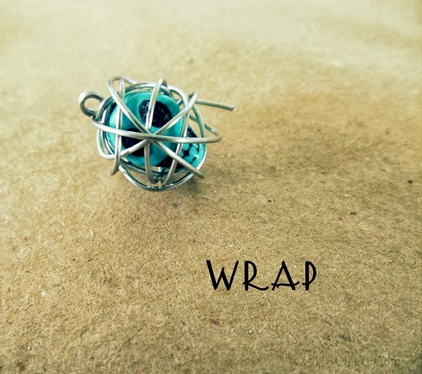 WobiSobi: Wire Wrapped, Skull Charm.