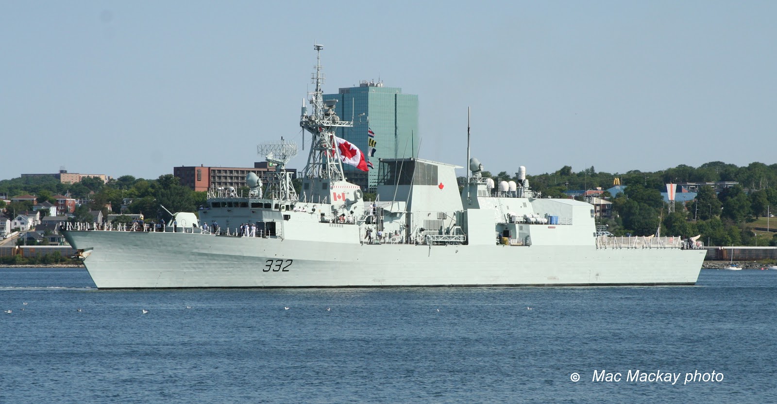 The guided-missile destroyer USS Stockdale (DDG 106) flies a 240-foot ...