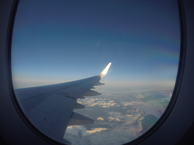 View of an airplane wing through a plane window free picture for ...