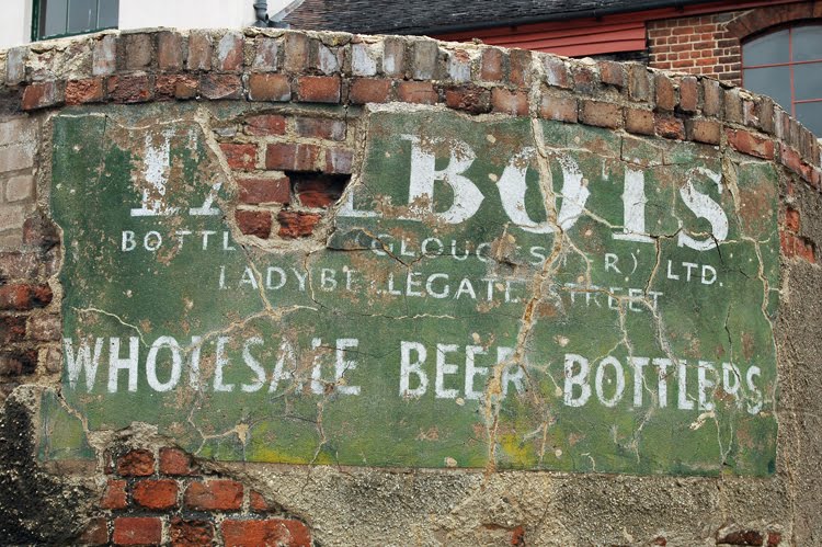 Painted signs and mosaics: Talbots, Gloucester