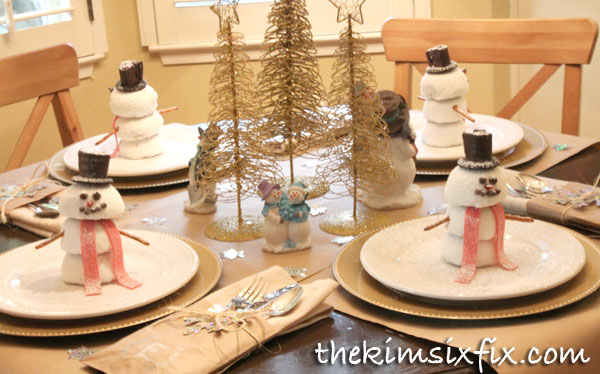 For the centerpiece I used some gold wire trees and some snowman ...