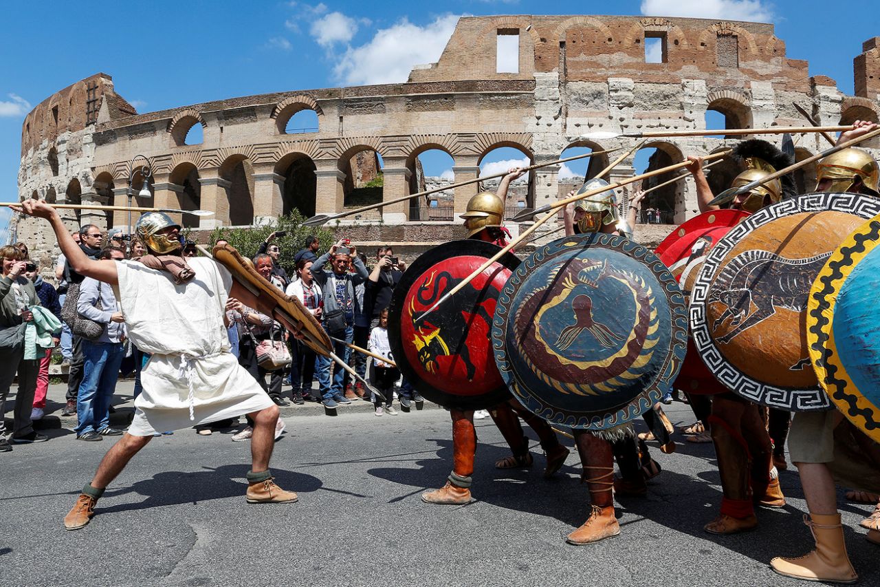 People dressed as ancient Romans parade