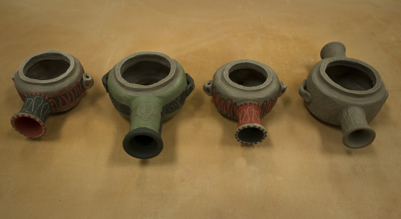 Hand Built Ceramic Drums: Refining, Attaching and Throwing this Week