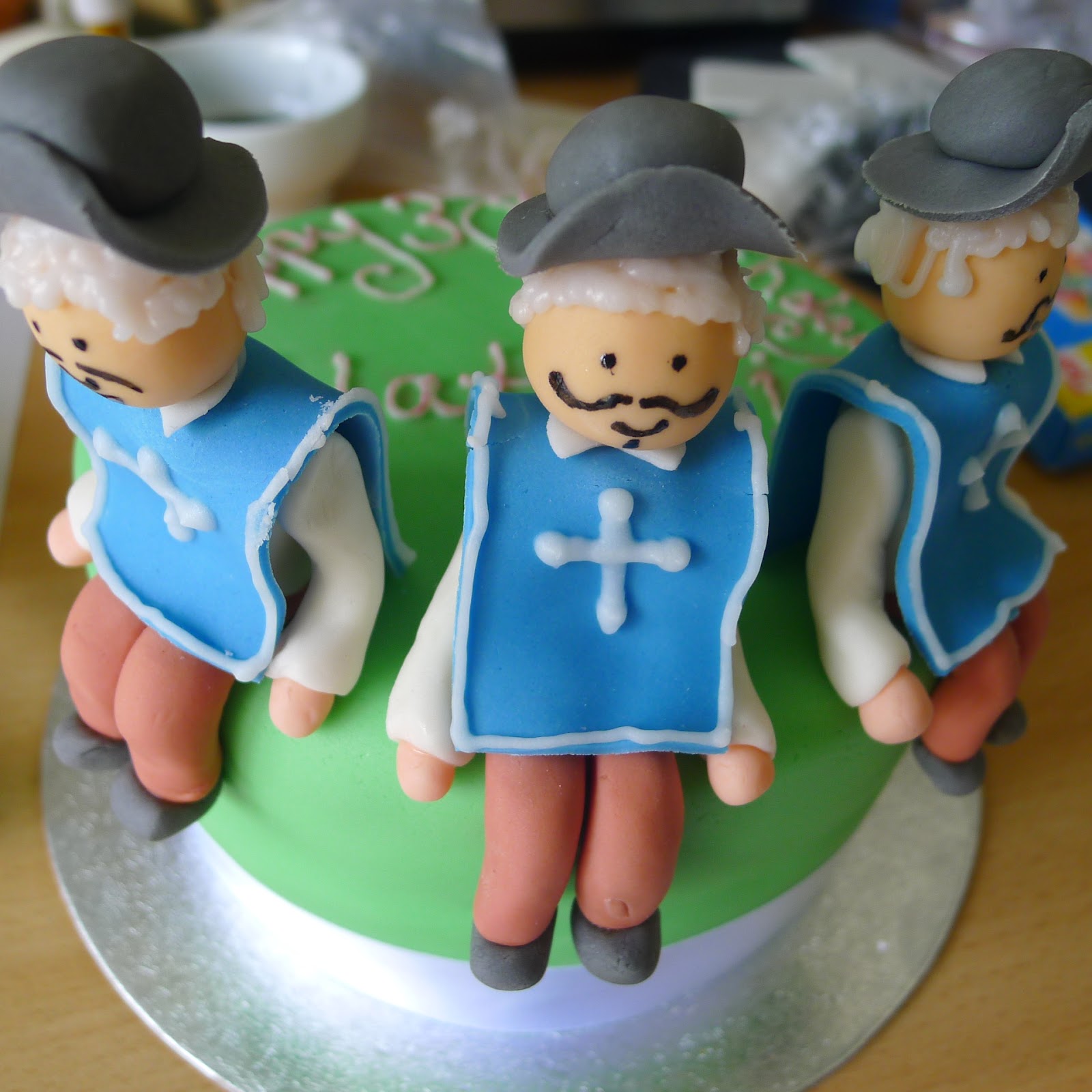 hello. is it tea you're looking for?: three musketeers cake