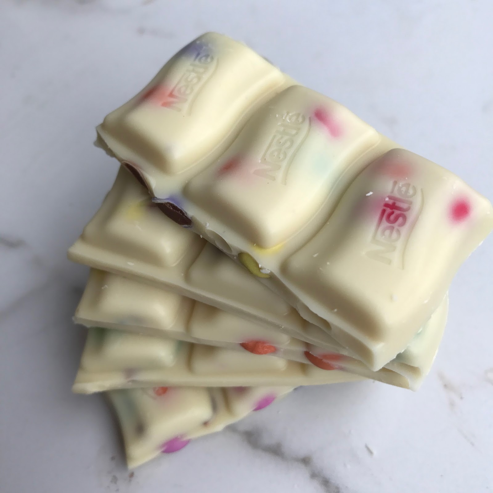 Archived Reviews From Amy Seeks New Treats: NEW! Nestle Milkybar with ...