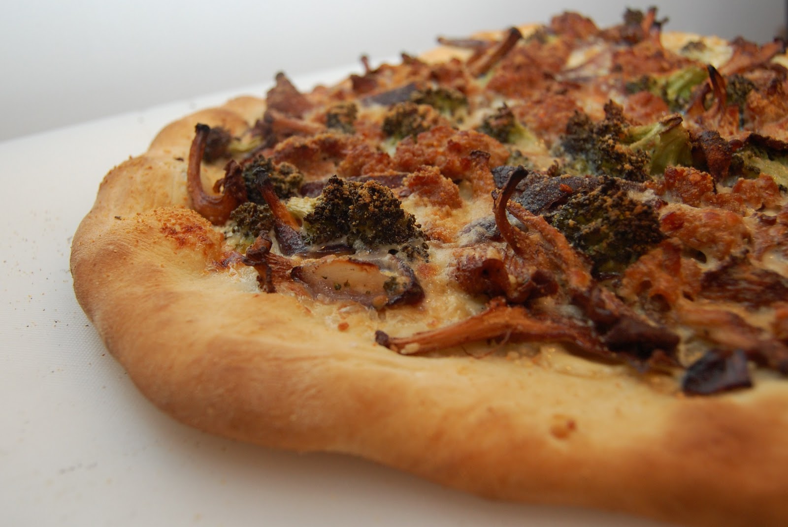 Feast: Roasted Chanterelle Pizza with Sausage and Parmesan Cream