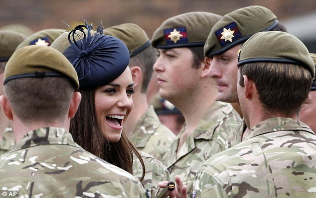 Kate in command: Duchess of Cambridge does dress uniform as she carries ...