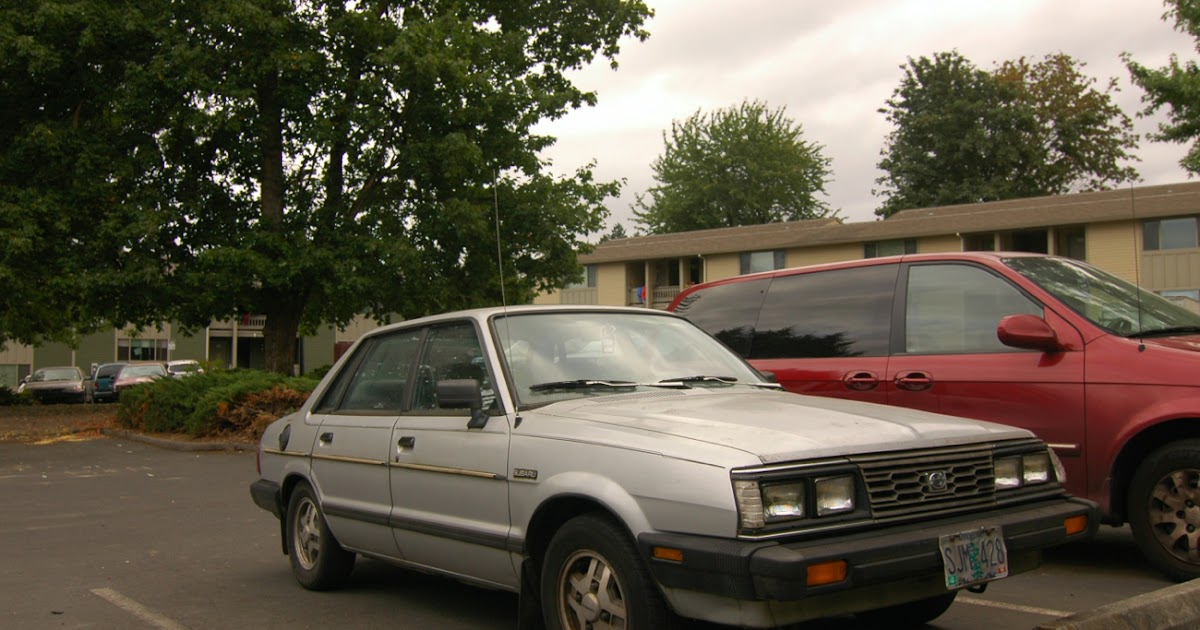 OLD PARKED CARS.: 1983 Subaru GL-10.
