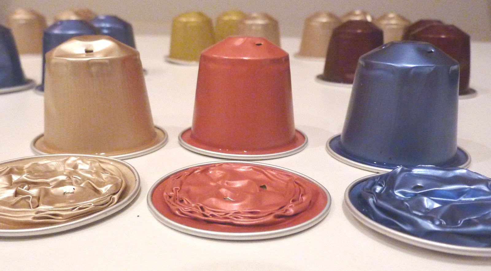 Gabale: NESPRESSO wearable coffee capsules.