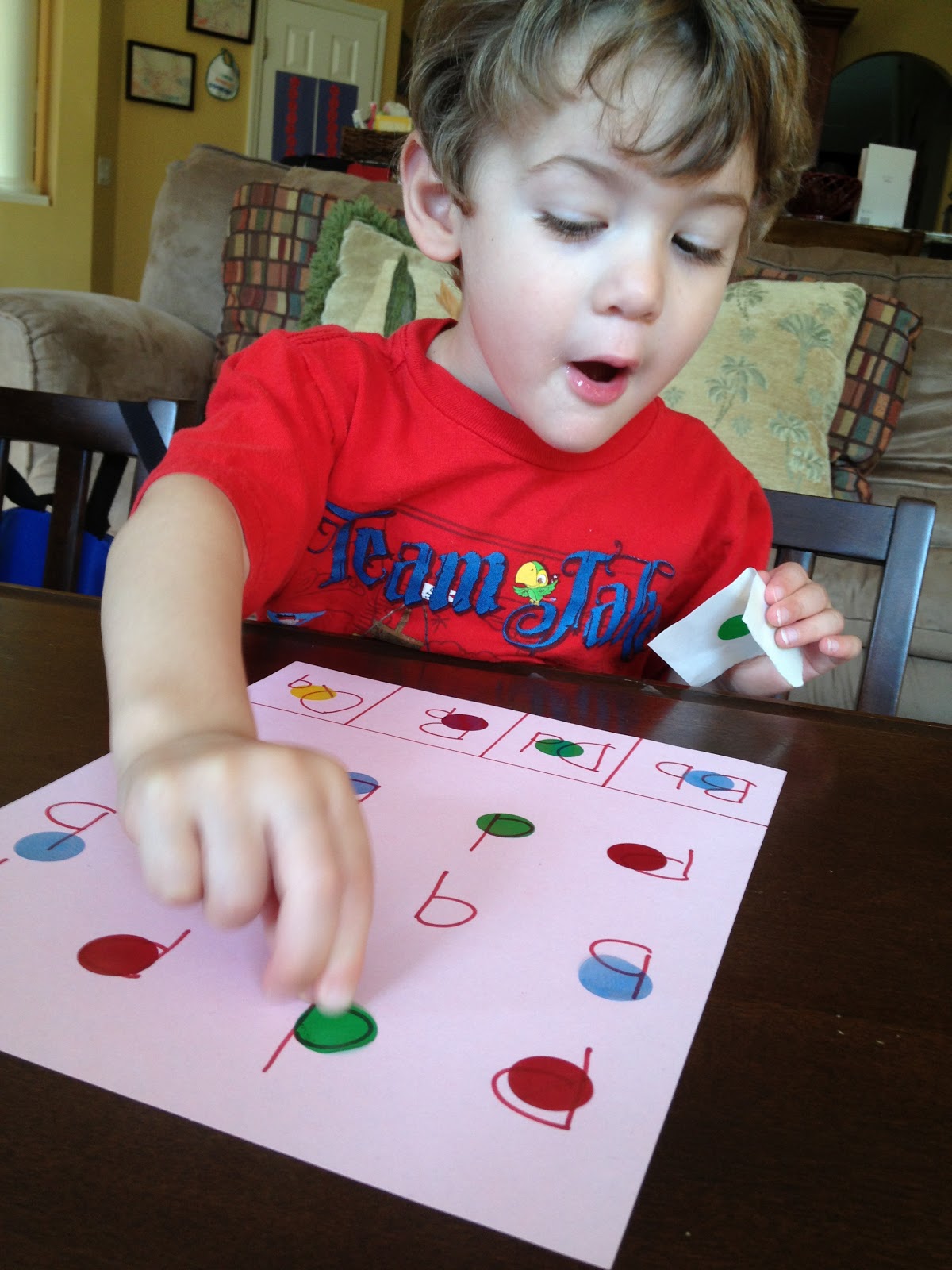 Two Much Fun: b,d,p,q Identification Game and Assessment