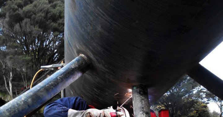 The Skysphere: Welding in the mud... only three more hoops to go