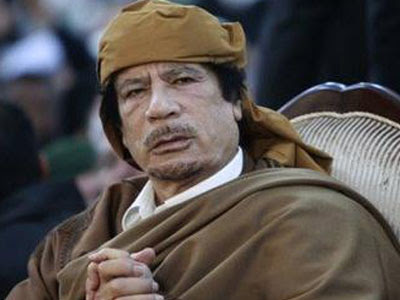 Muammar Gaddafi 'buried in desert grave at dawn' - Spyful Breaking News