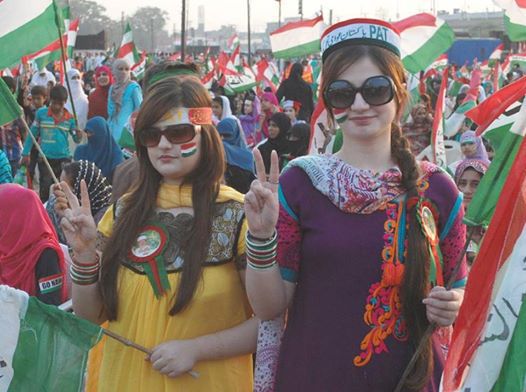 Beautiful Girl in PTI Jalsaa Victory Symbol