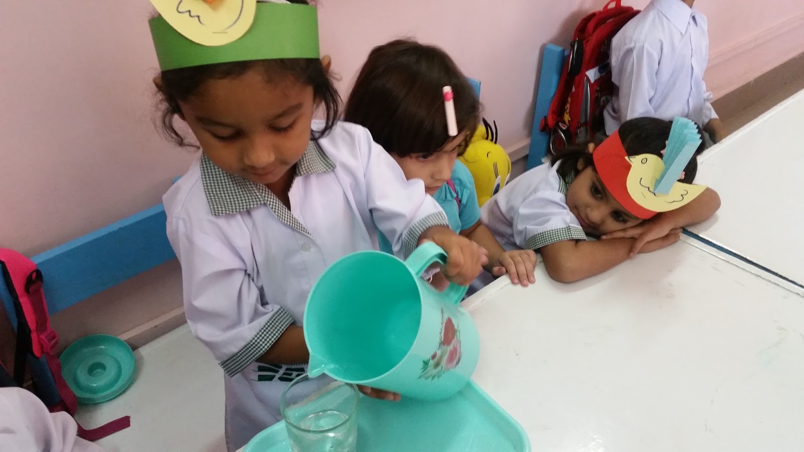Red Little stars: EPL activity (water pouring and mopping activity)