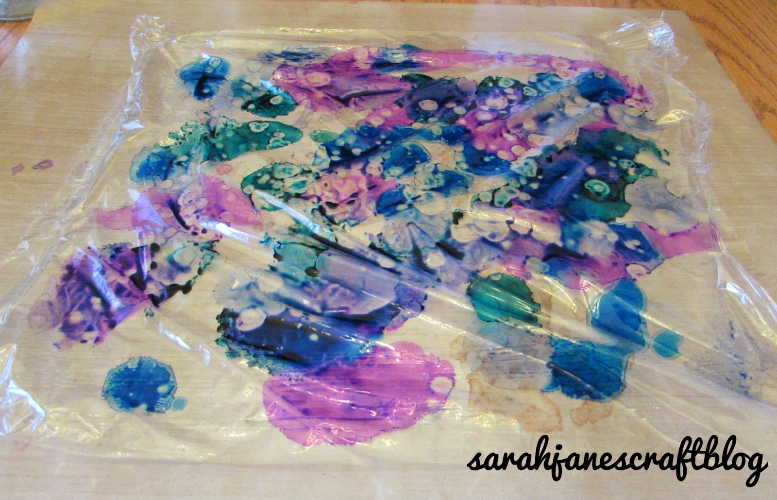 Alcohol Ink and Plastic Wrap on a Glass Bottle