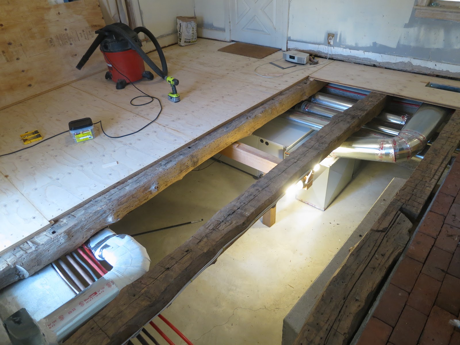 An Old Farm: Laying a Subfloor on Old Beams