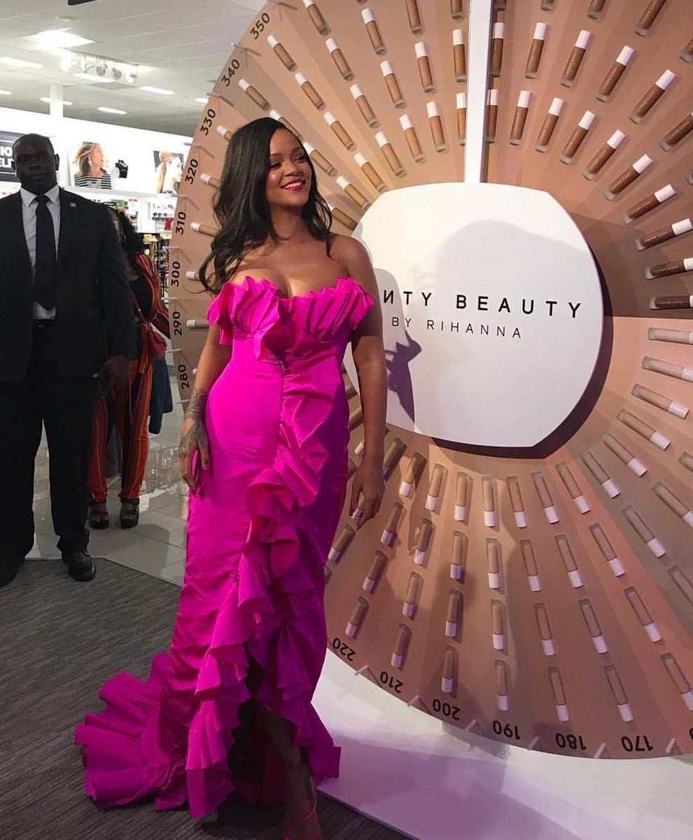 Rihanna goes feisty in fuchsia as she celebrates Fenty Beauty's 1st ...