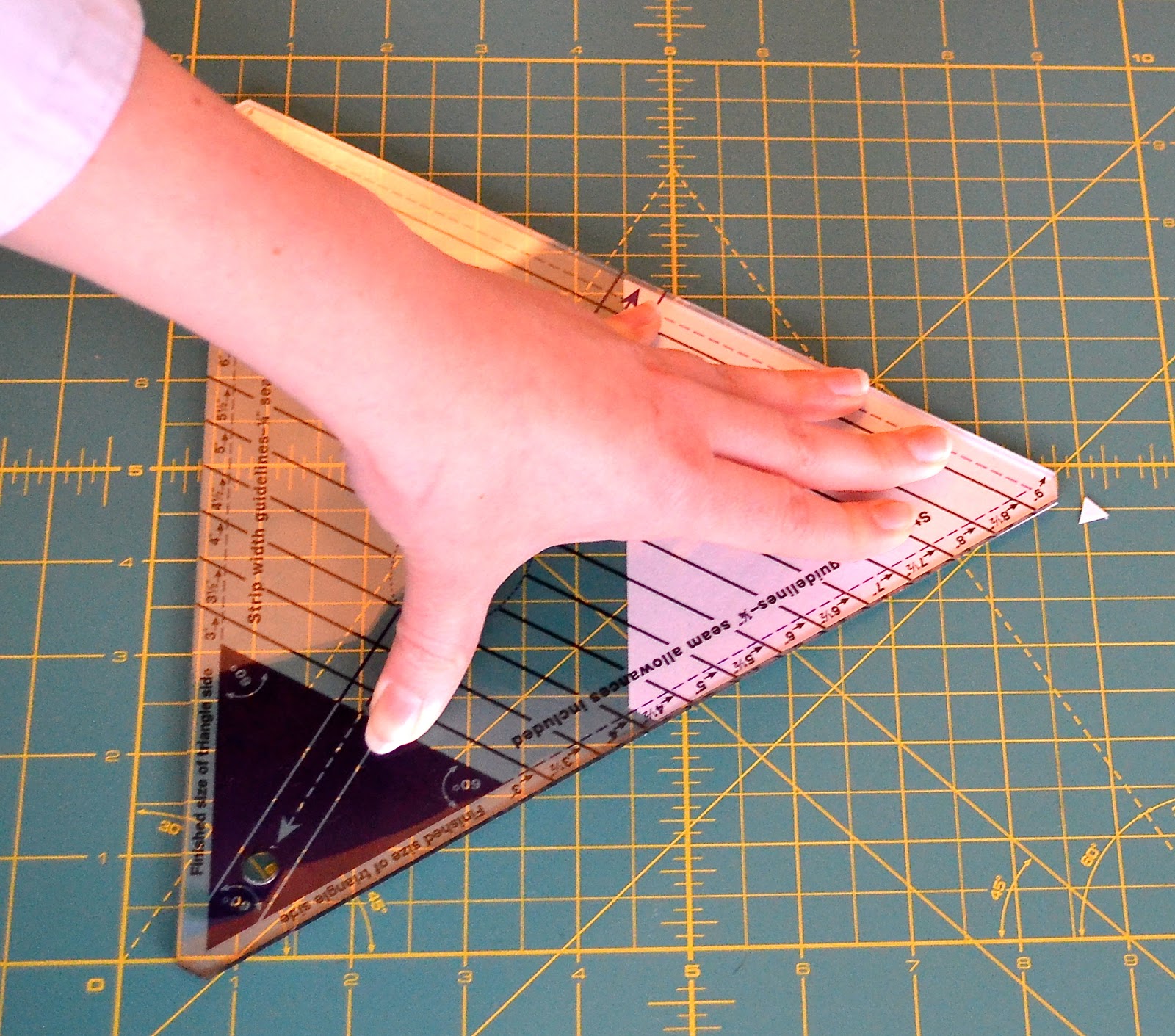 On the Windy Side: How to cut equilateral triangles - a tutorial