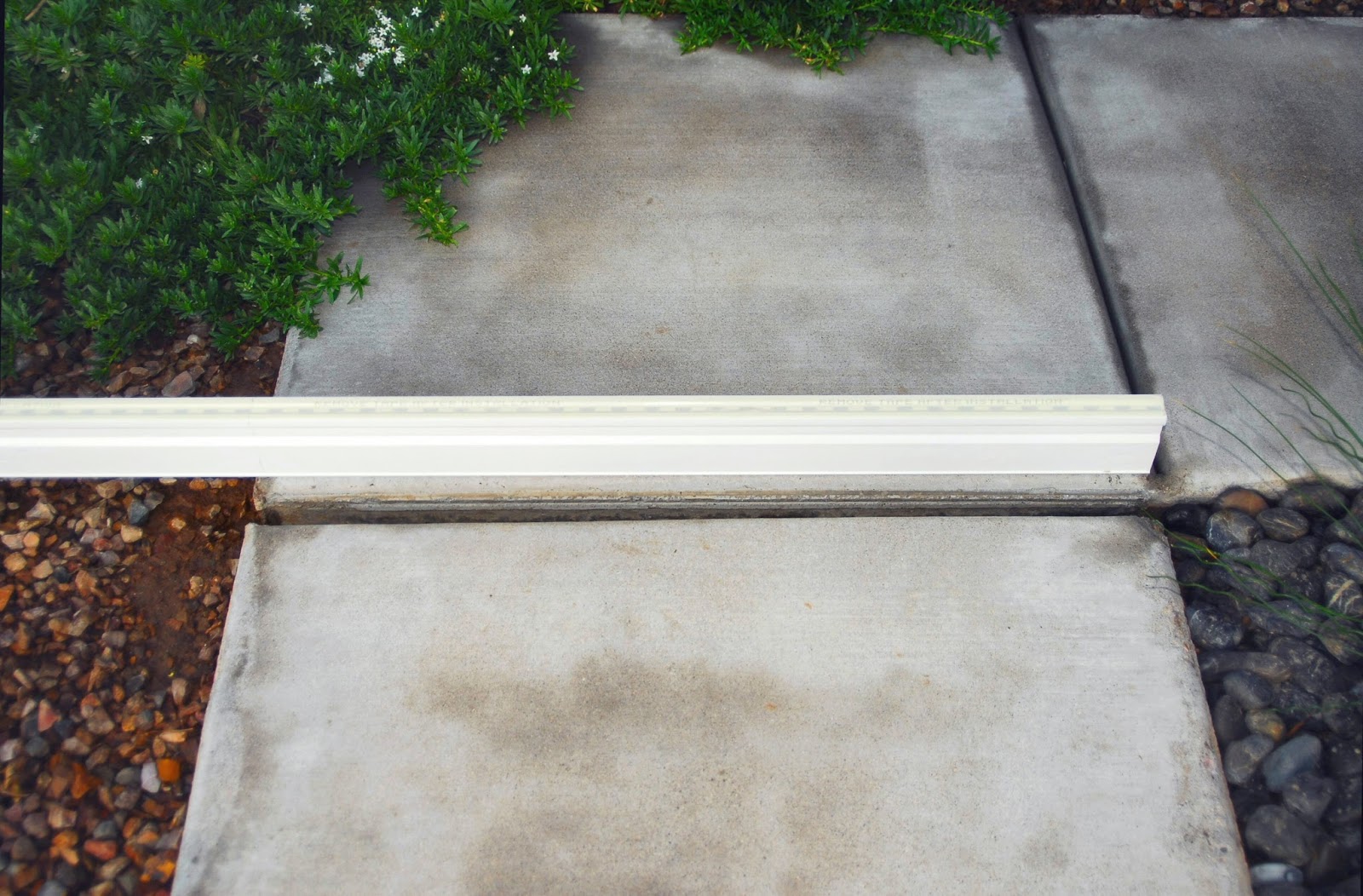 Phoenix Handyman and Wood Restoration: Replacing a sidewalk channel drain