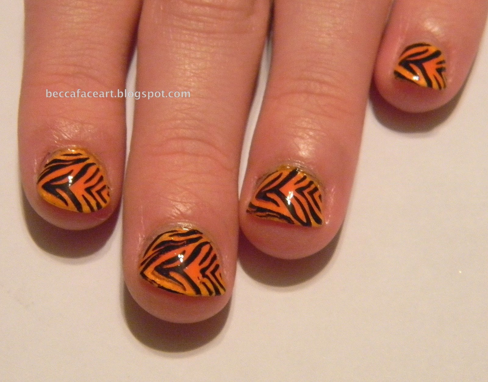 Becca Face Nail Art: Tiger Nails