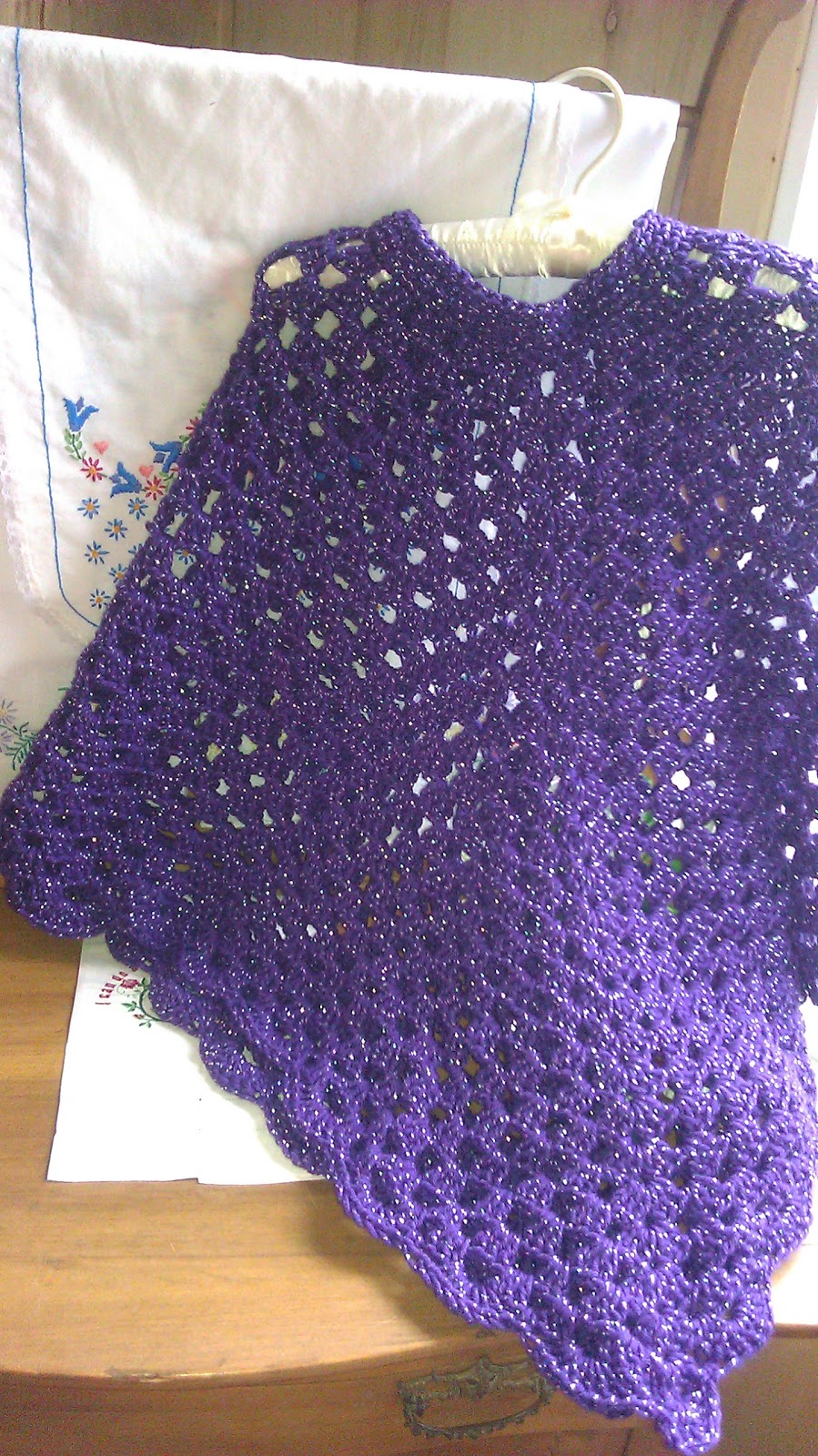 Rita Hutcheson-Cobbs: The purple glittery crochet poncho...