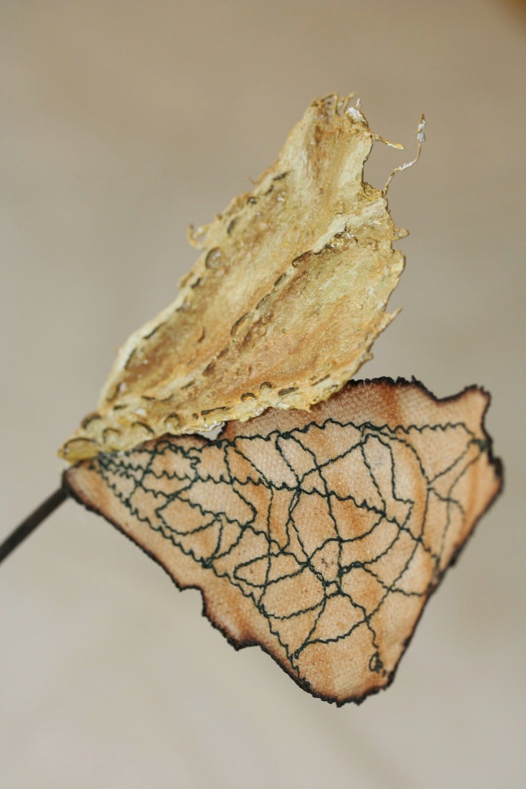 Silver Bells and Cockle Shells: Modroc sculpture of dying flower