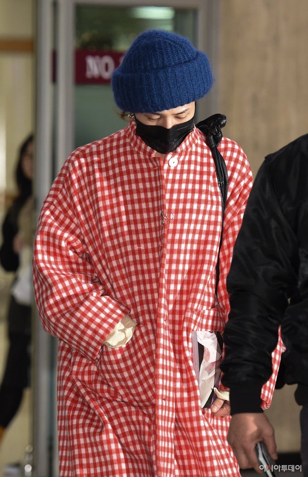 GD channels picnic blanket vibes for his airport fashion