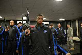 the other paper: Duke men's basketball team poses with assault rifles ...