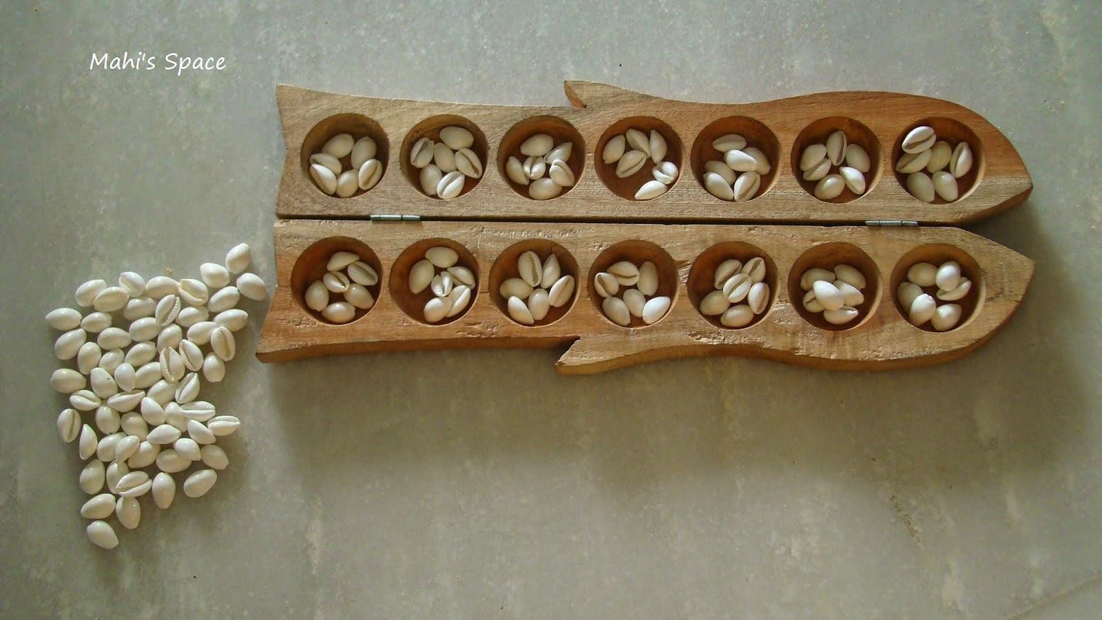 D.K.'s Learning Centre: PALLANKUZHI - An extinct traditional game of India