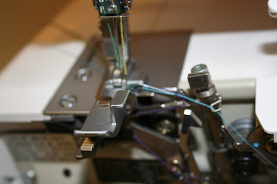 Tammy's Craft Emporium: White Superlock 2000 serger and dog bed.