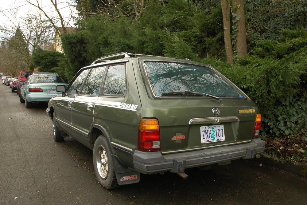 OLD PARKED CARS.: 1983 Subaru GL Station Wagon.
