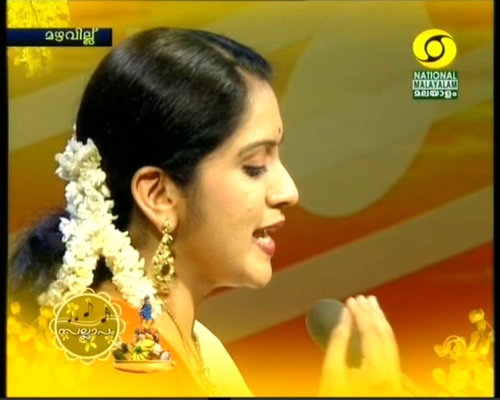 playback singer akhila anand in set saree cute images