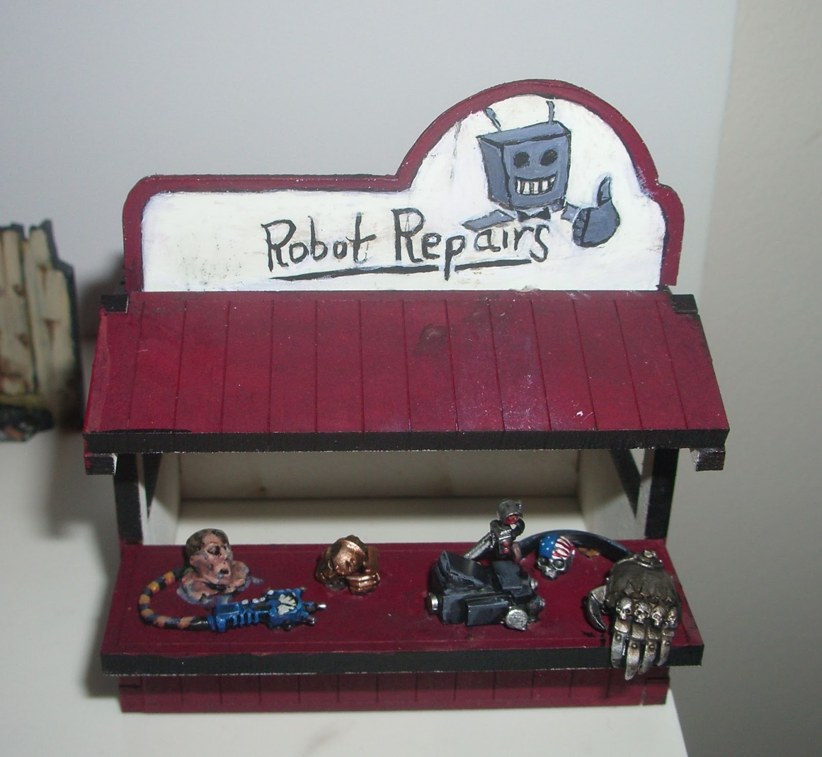 In A World of Paint: Robot Repair Shop