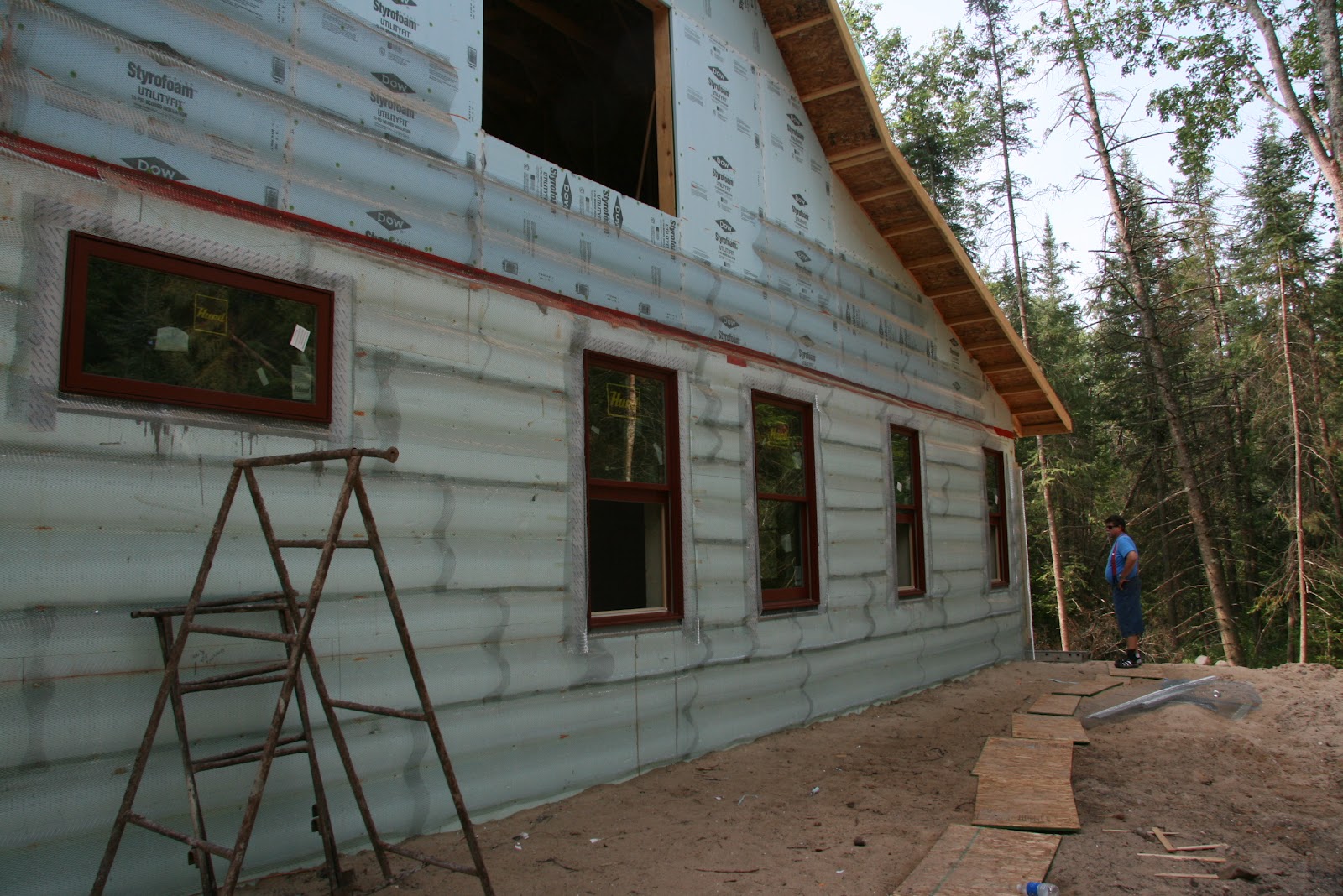 River's Edge Project: Perma Log siding adds to the uniqueness of this home.