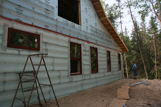 River's Edge Project: Perma Log siding adds to the uniqueness of this home.