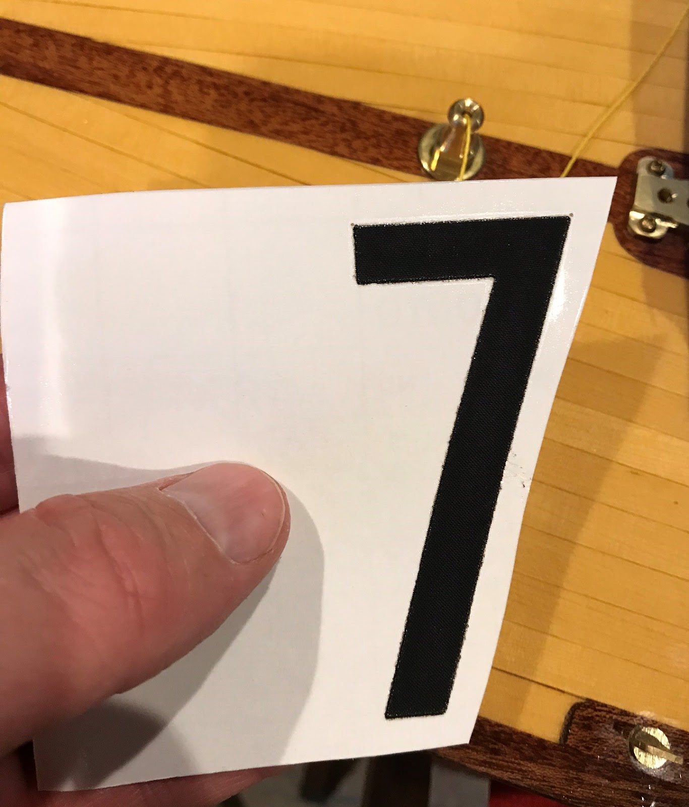 Laser-cutting Sail Numbers and Insignia