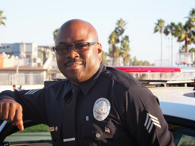 CAT IN THE ACT: LAPD Sergeant