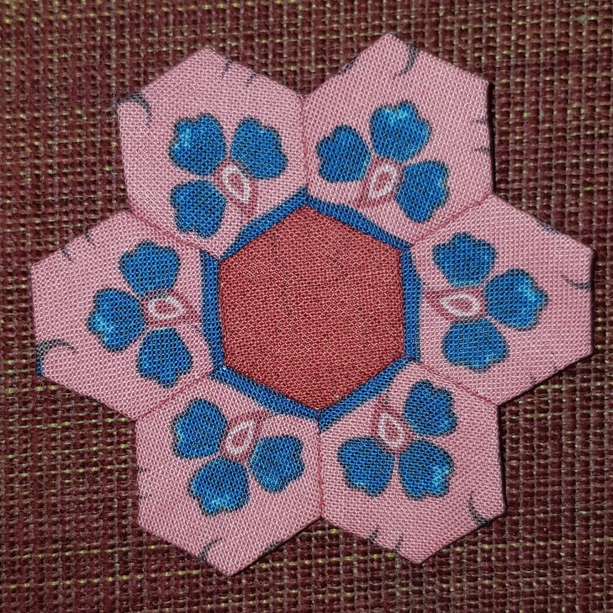 Feather On A Wire: English Paper piecing and hexagons.