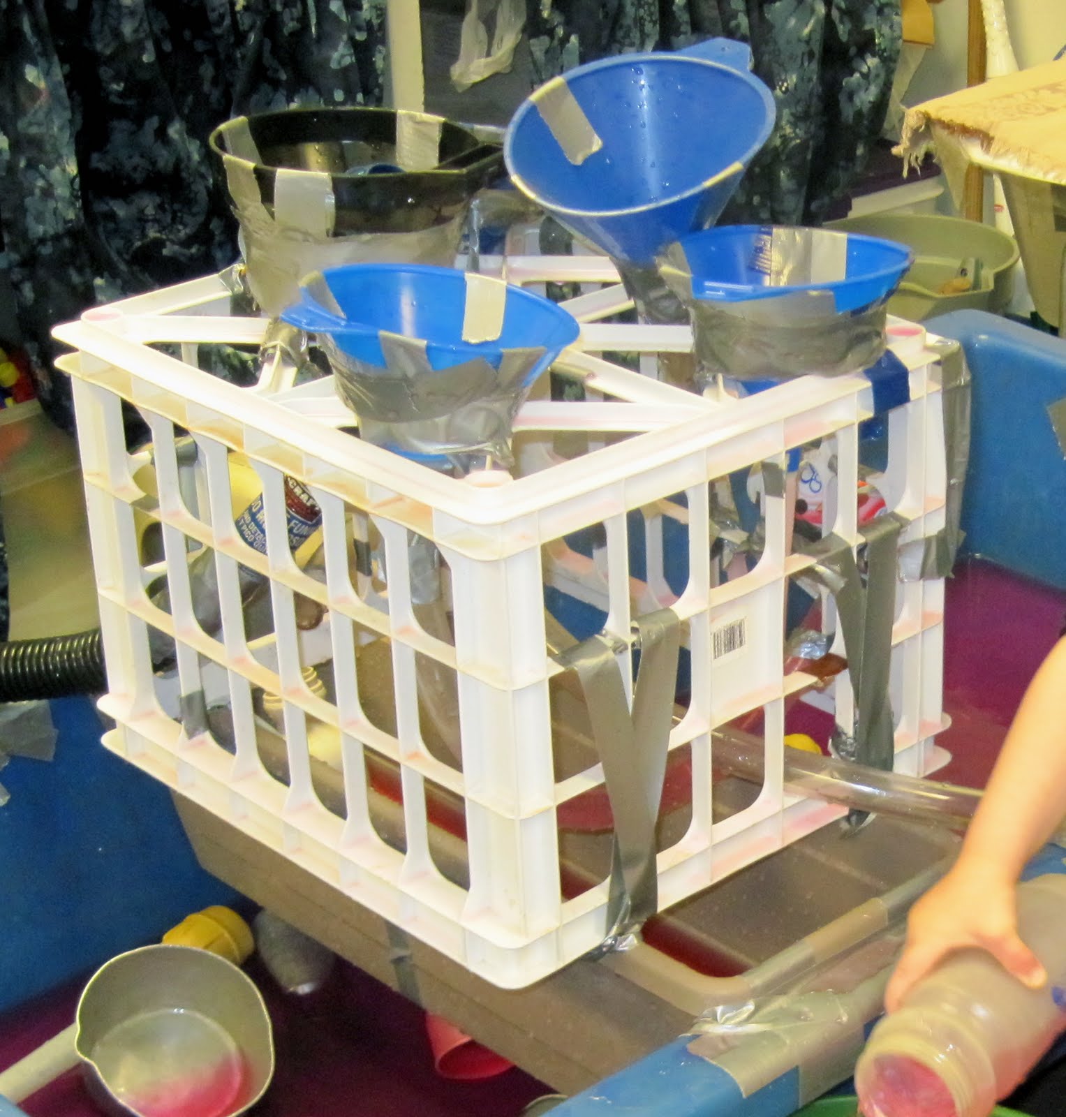 SAND AND WATER TABLES: FUNNELS AND CLEAR PLASTIC TUBING