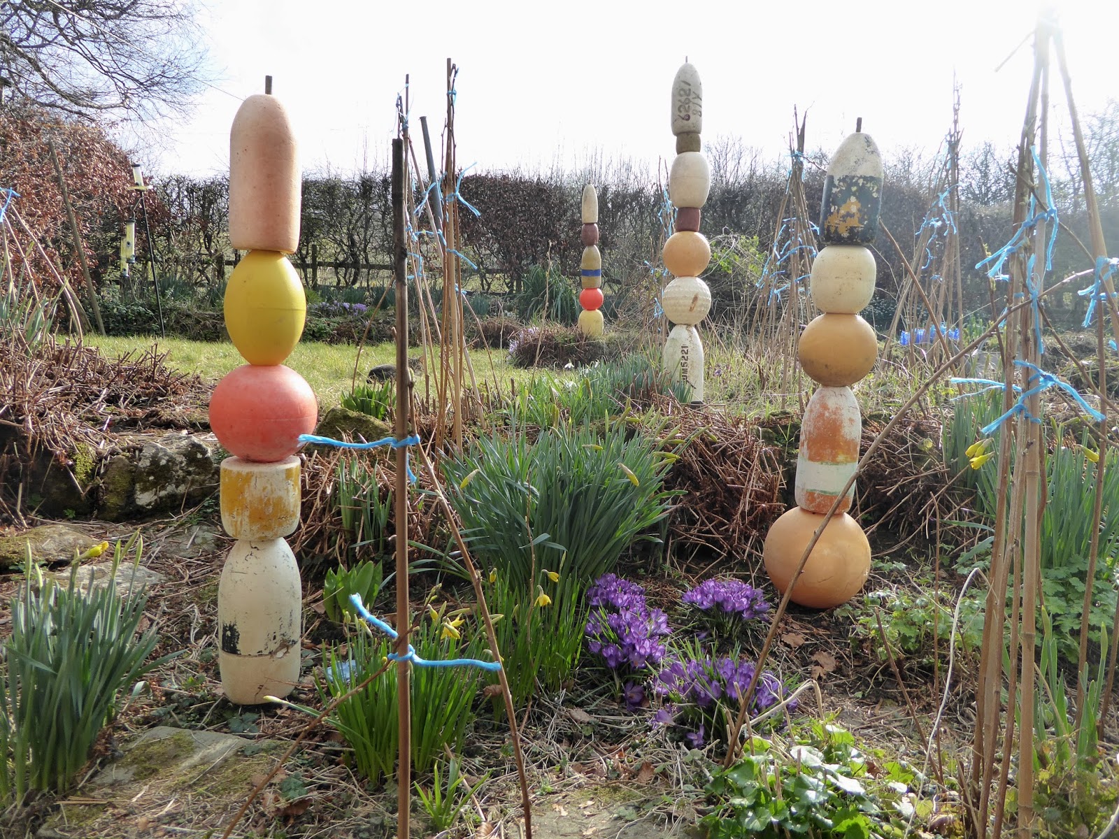 Julia Garner : Pot marker poles.