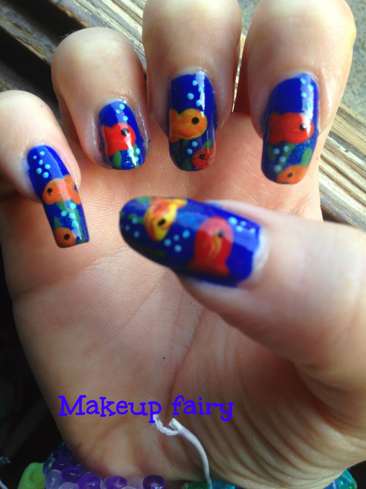Tinklesmakeup: goldfishes nail art/ nail art pesci rossi